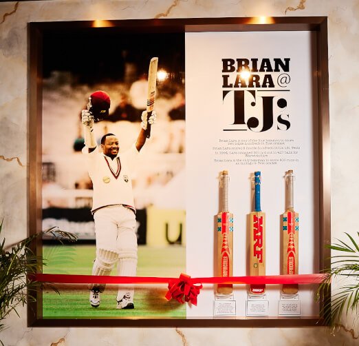 Brian Lara unveils a memorabilia wall at TJ’s